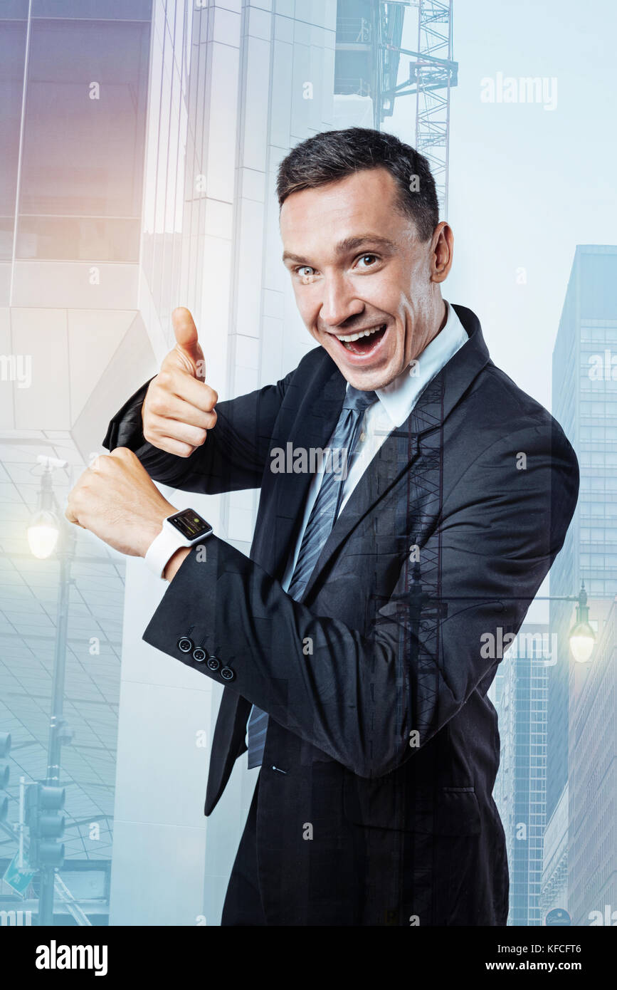 Happy cheerful businessman showing Ok sign Stock Photo - Alamy