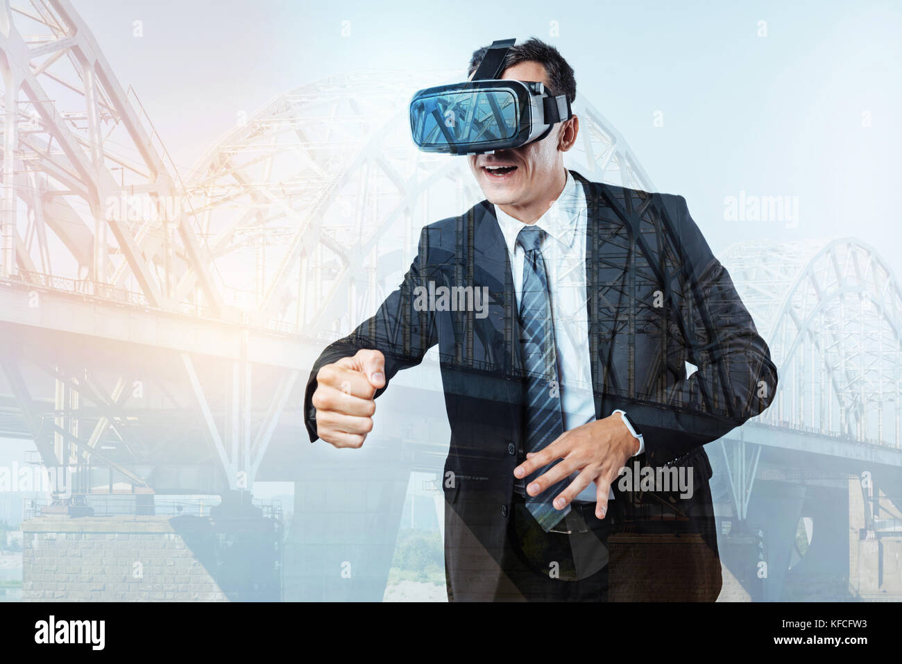 Nice handsome man being in a virtual dimension Stock Photo - Alamy