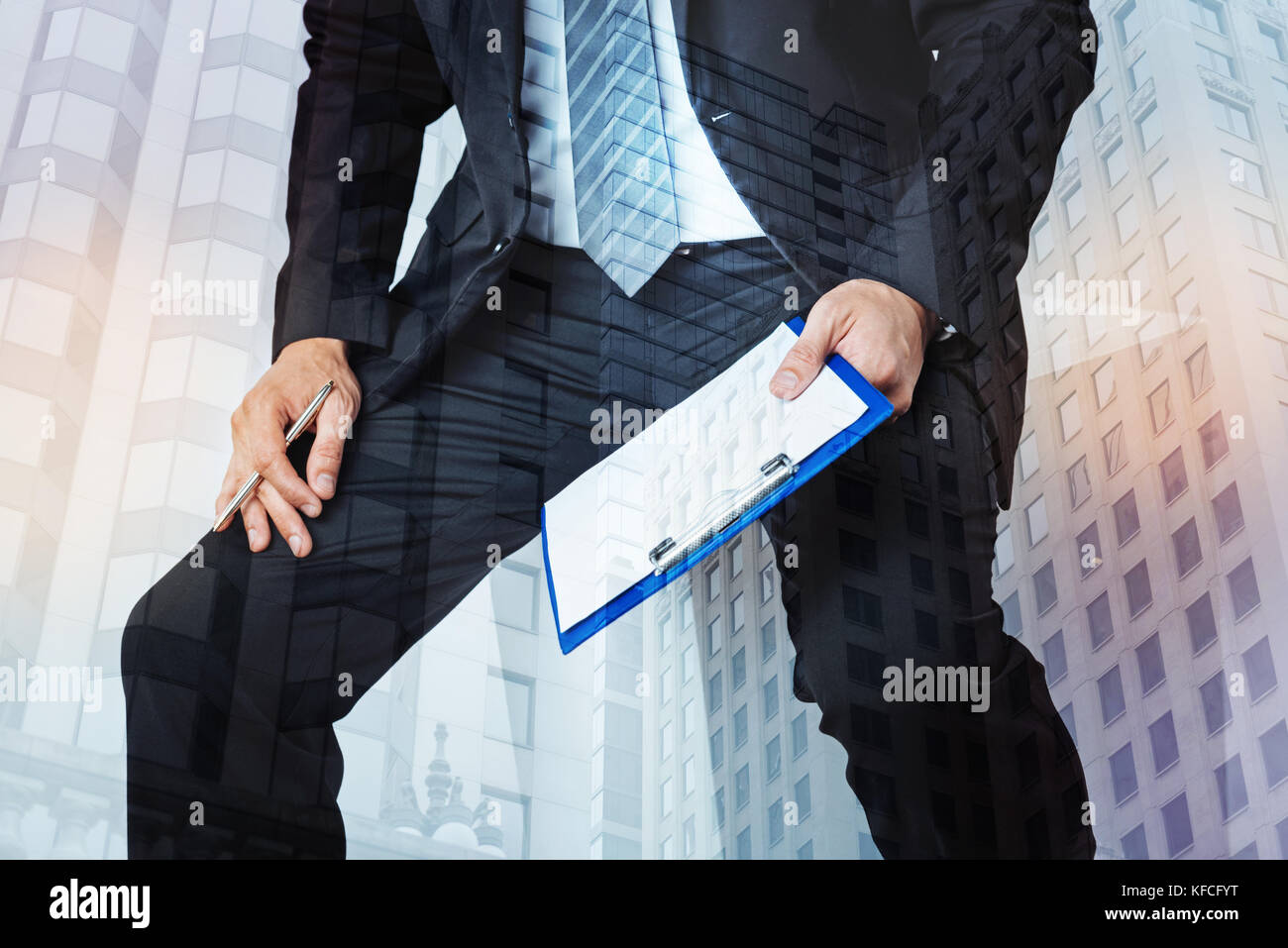 Close up of a pleasant handsome businessman holding notes Stock Photo ...