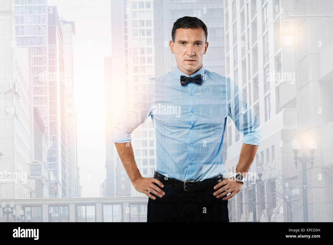 Confident handsome man looking at you Stock Photo - Alamy