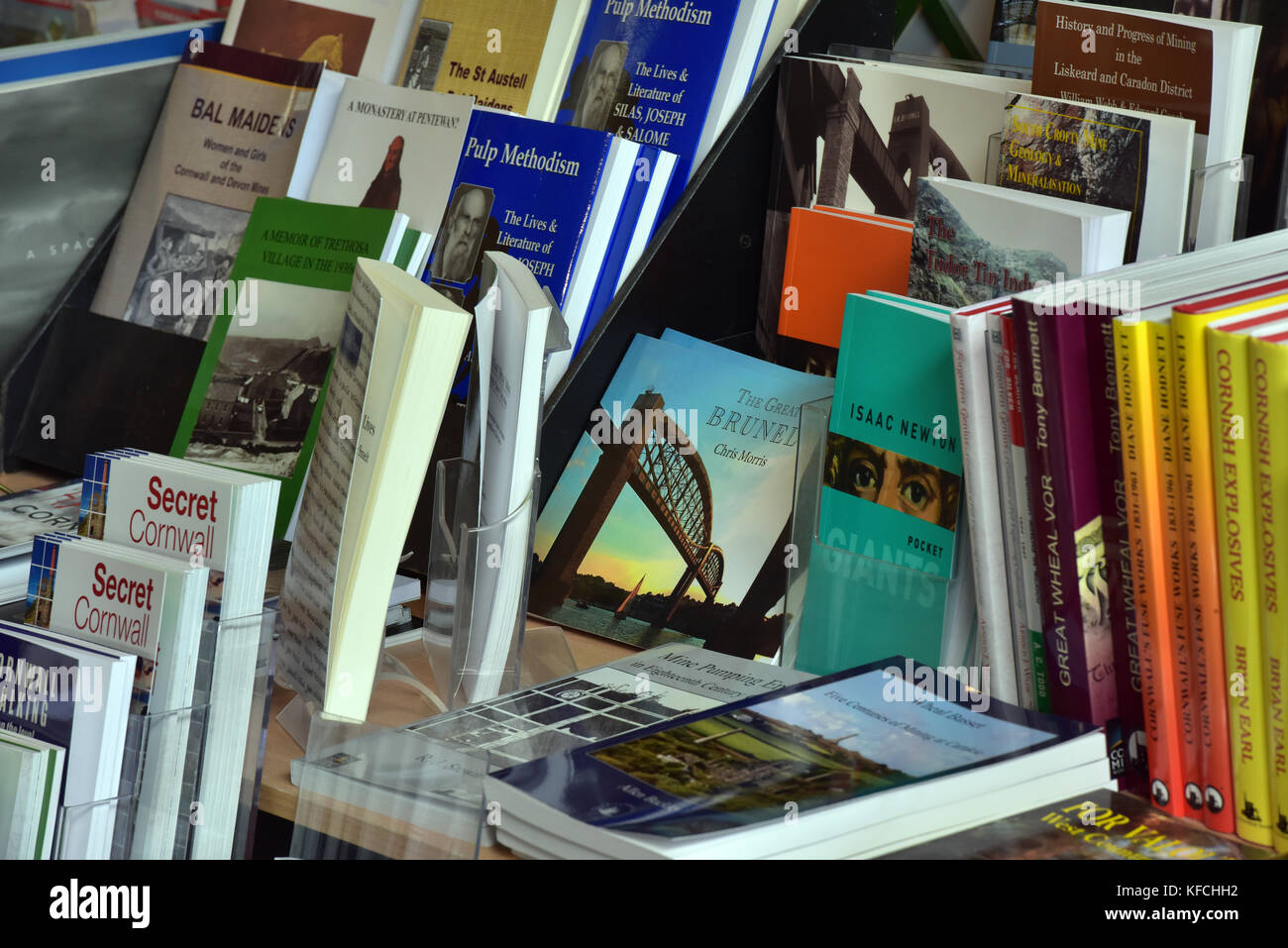 a collection of books about Cornwall for sale at a bookshop at wheal ...