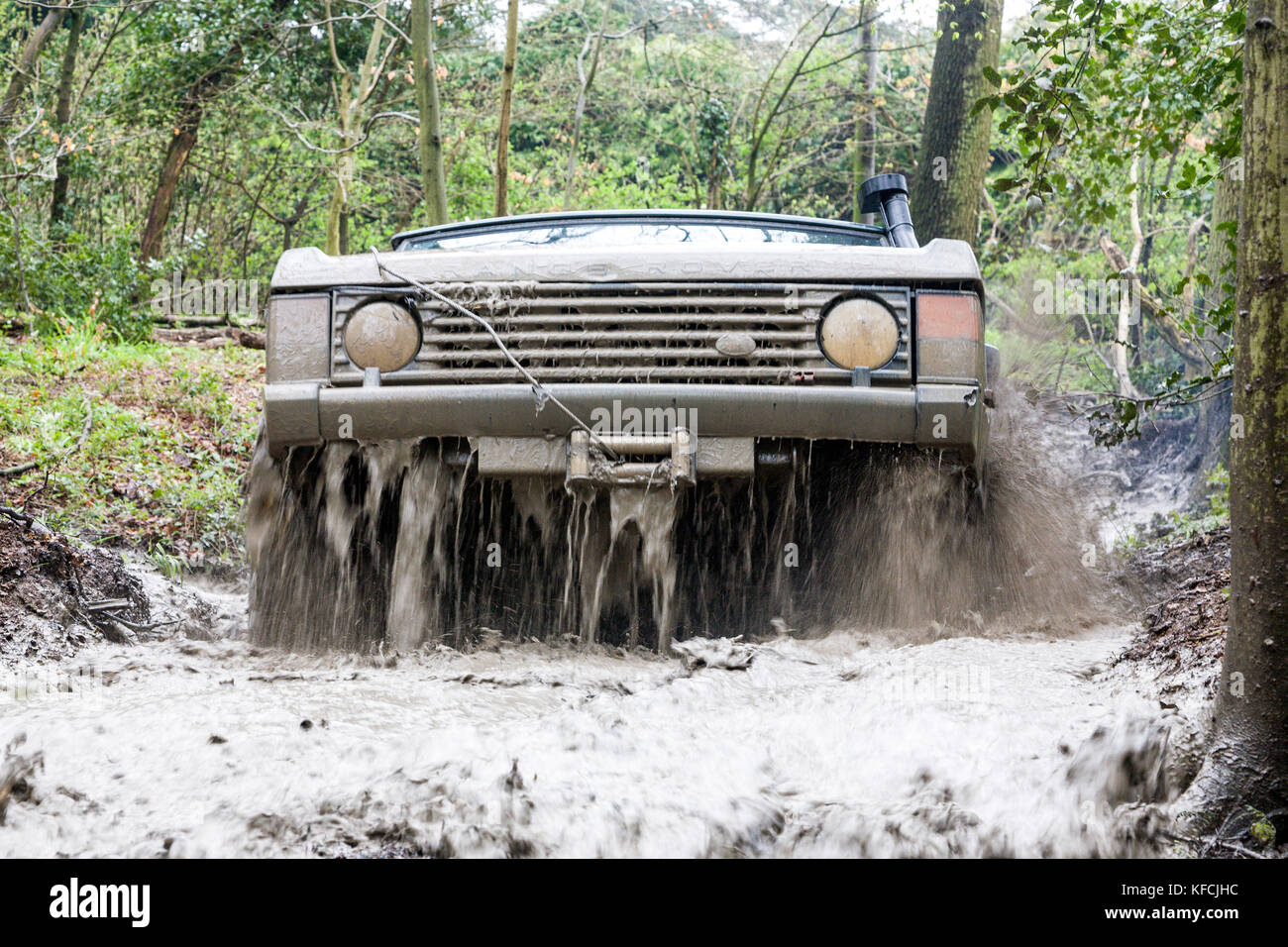 Offroad Range Rover Deep in Mud Stock Photo - Alamy