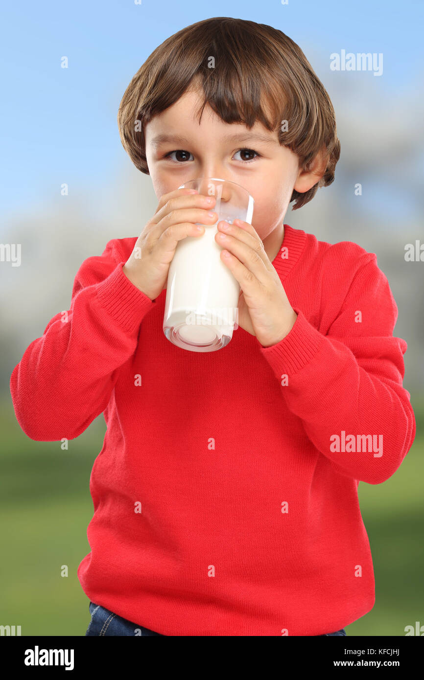 Child drinking milk kid glass healthy eating portrait format drink ...