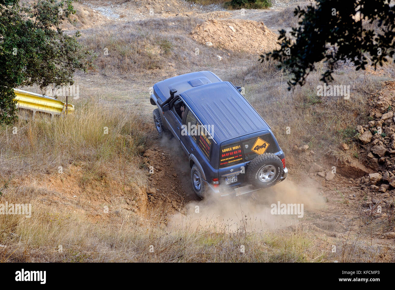 A Nissan Patrol in action in the dirt roads of a trial track Stock ...
