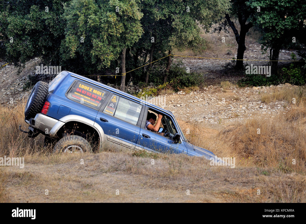 A Nissan Patrol in action in the dirt roads of a trial track Stock ...