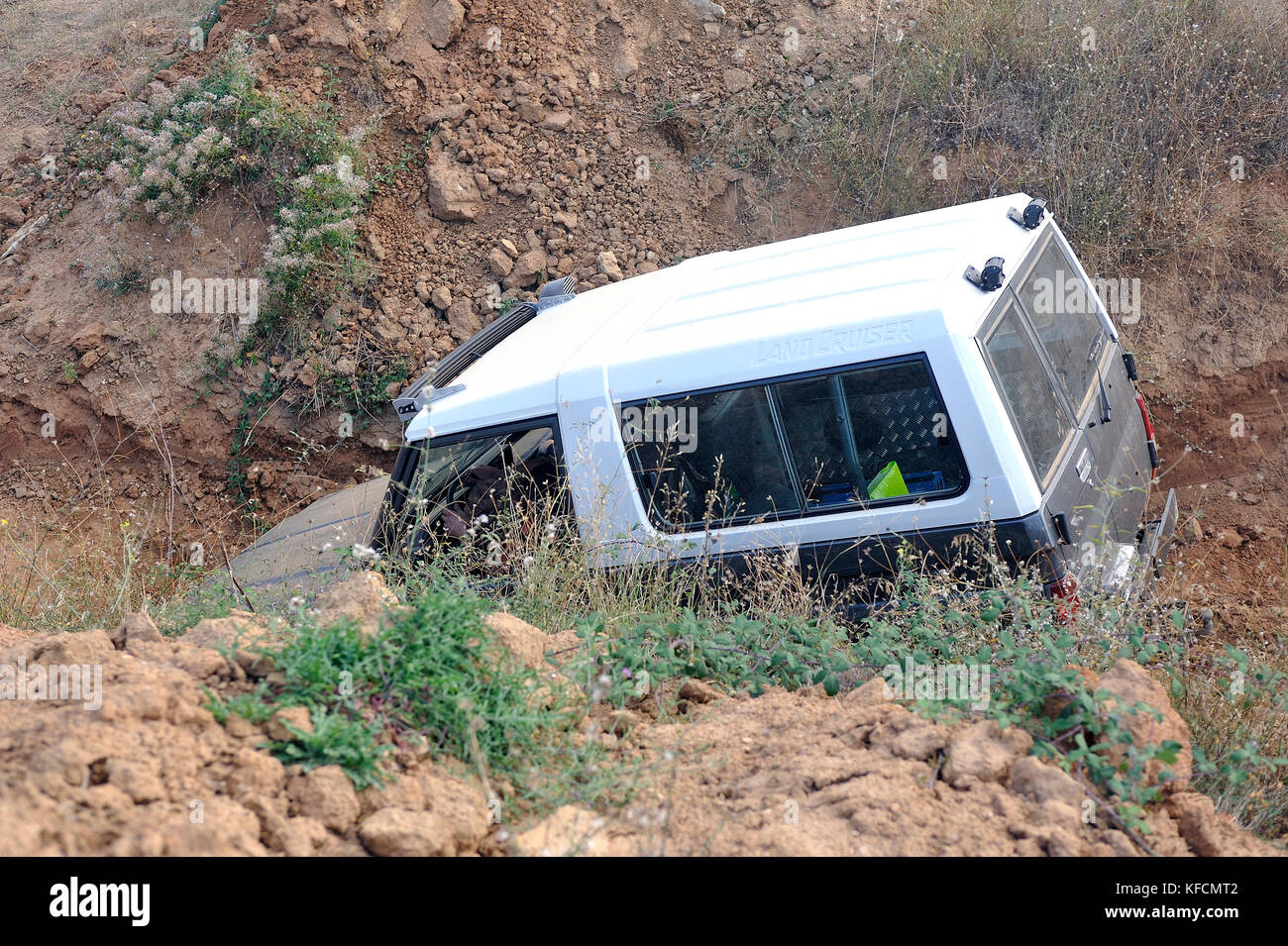 Large excavator digging hole sparks cars on trial grounds Stock Photo ...