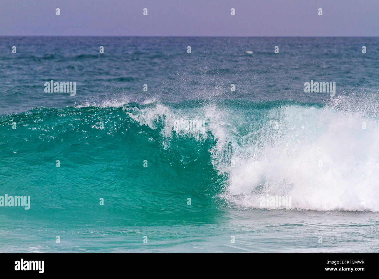turquoise wave breaks up to the shore Stock Photo - Alamy