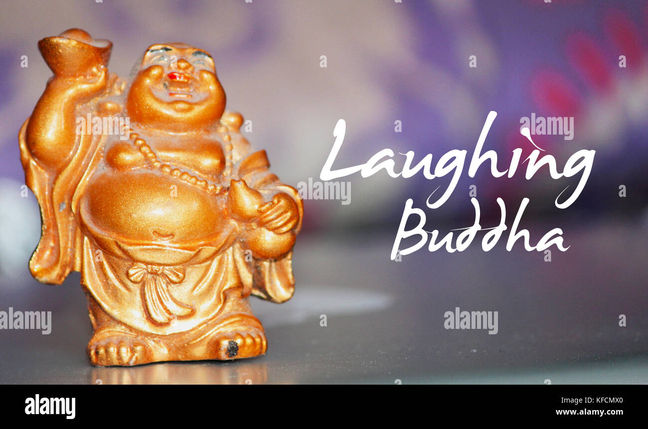 Statue of laughing buddha Stock Photo - Alamy