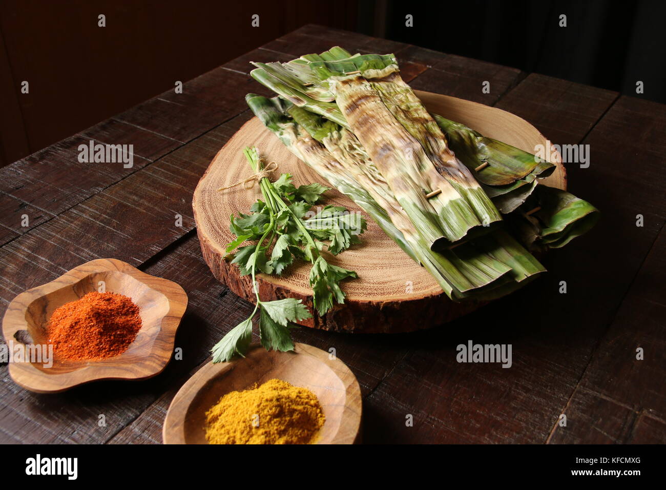 Otah-otah, Grilled Spicy Fish Cake in Banana Leaf Parcels Stock Photo ...