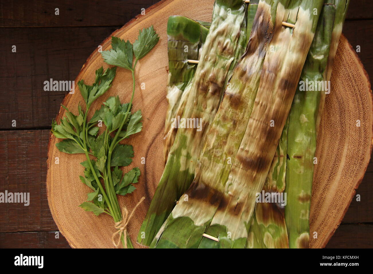 Otah-otah, Grilled Spicy Fish Cake in Banana Leaf Parcels Stock Photo ...