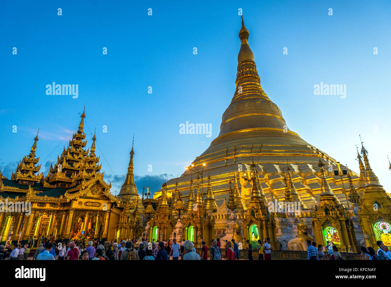 Myanmar (formerly Burma). Yangon. (Rangoon). People at Shwedagon Pagoda ...