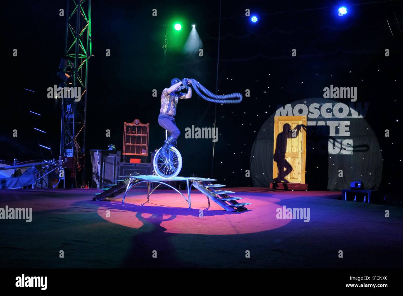 circus performers unicycle Stock Photo - Alamy