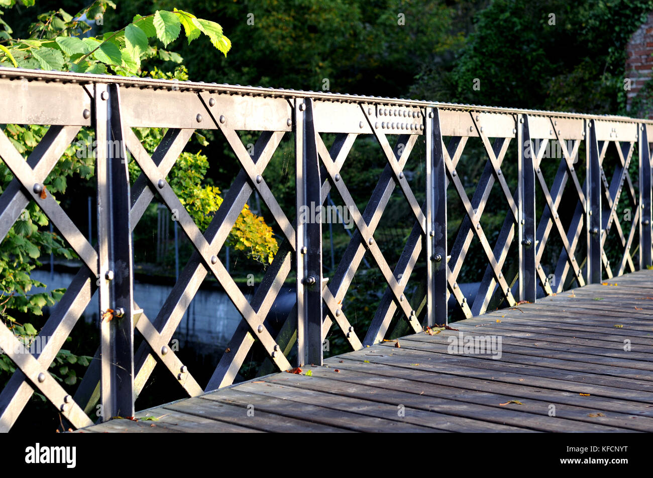 steel railing at wooden footbridge Stock Photo - Alamy