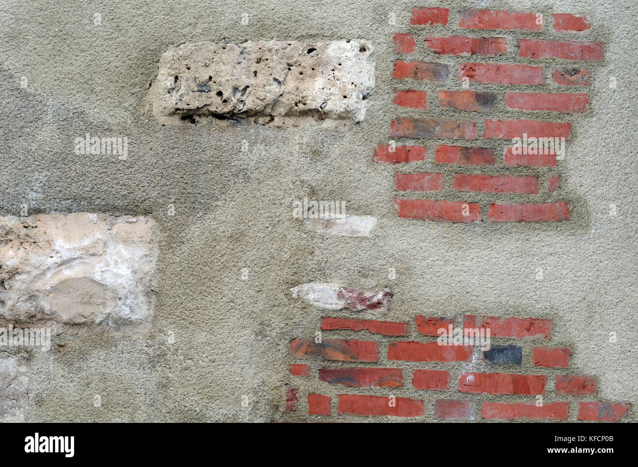 antique wall constructed with different materials Stock Photo - Alamy