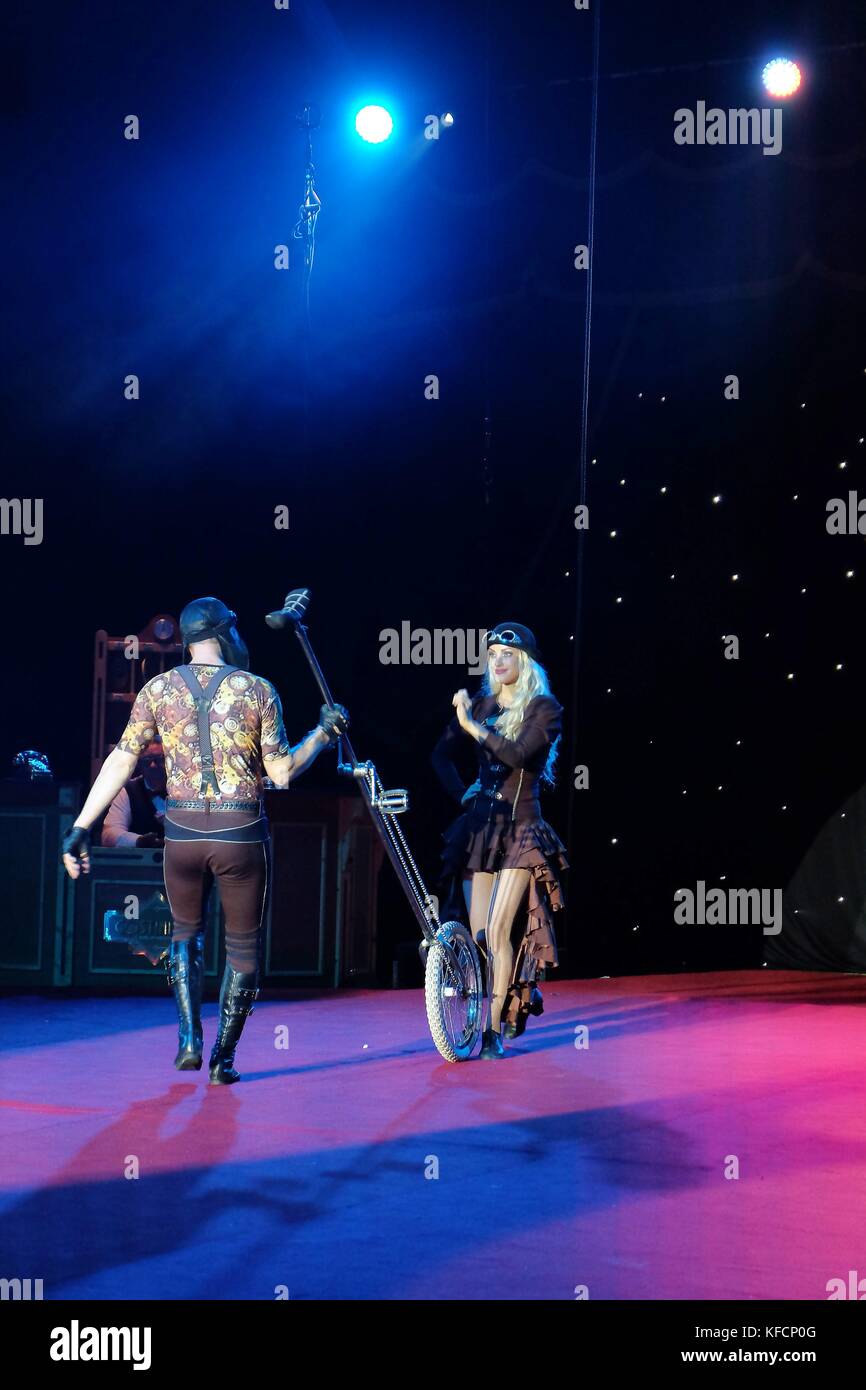 circus act unicycle and steampunk Stock Photo - Alamy