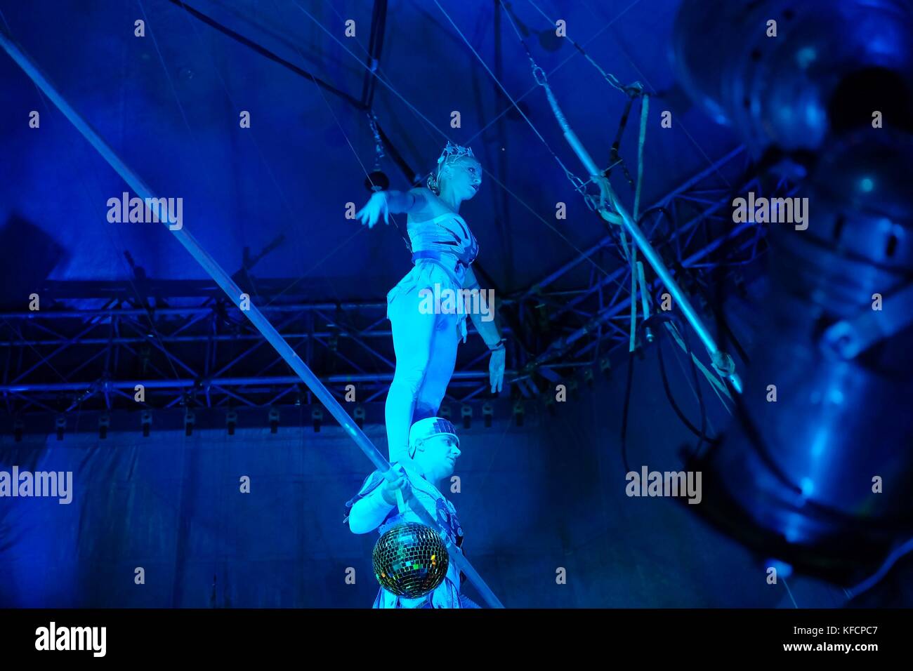 circus performers tight rope act Stock Photo - Alamy