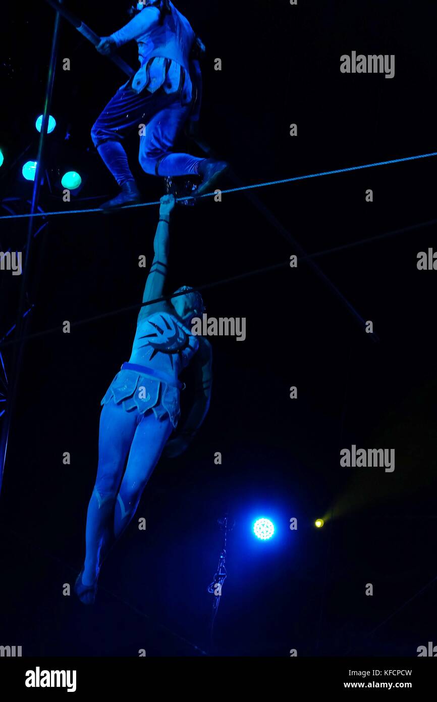 Hanging onto rope hi-res stock photography and images - Alamy