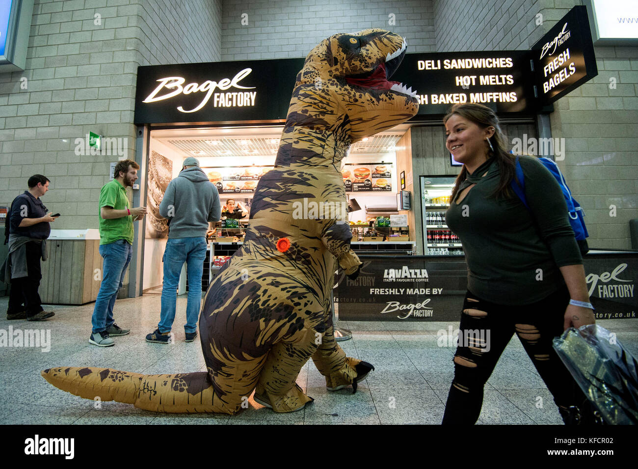 A cosplayer dressed as a dinosaur at the London Comic Con at the ExCel ...