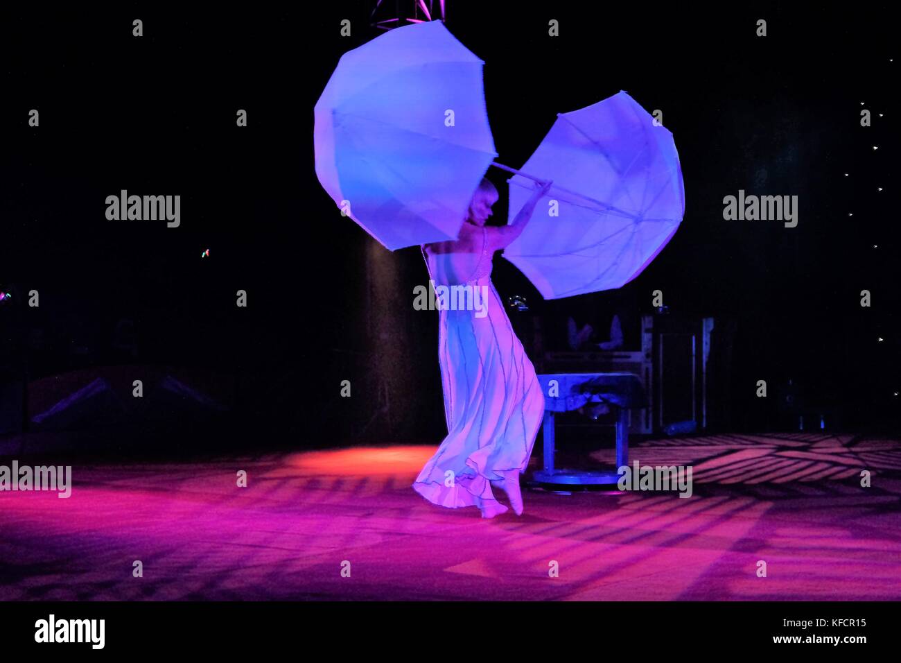 circus performer dancing with umbrella Stock Photo - Alamy