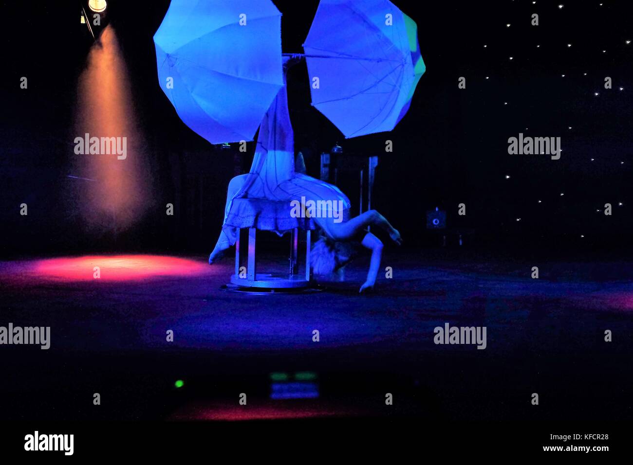 circus performer dancing with umbrella Stock Photo - Alamy