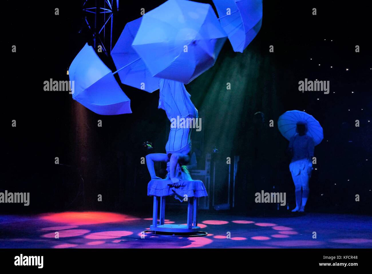 circus performer dancing with umbrella Stock Photo - Alamy