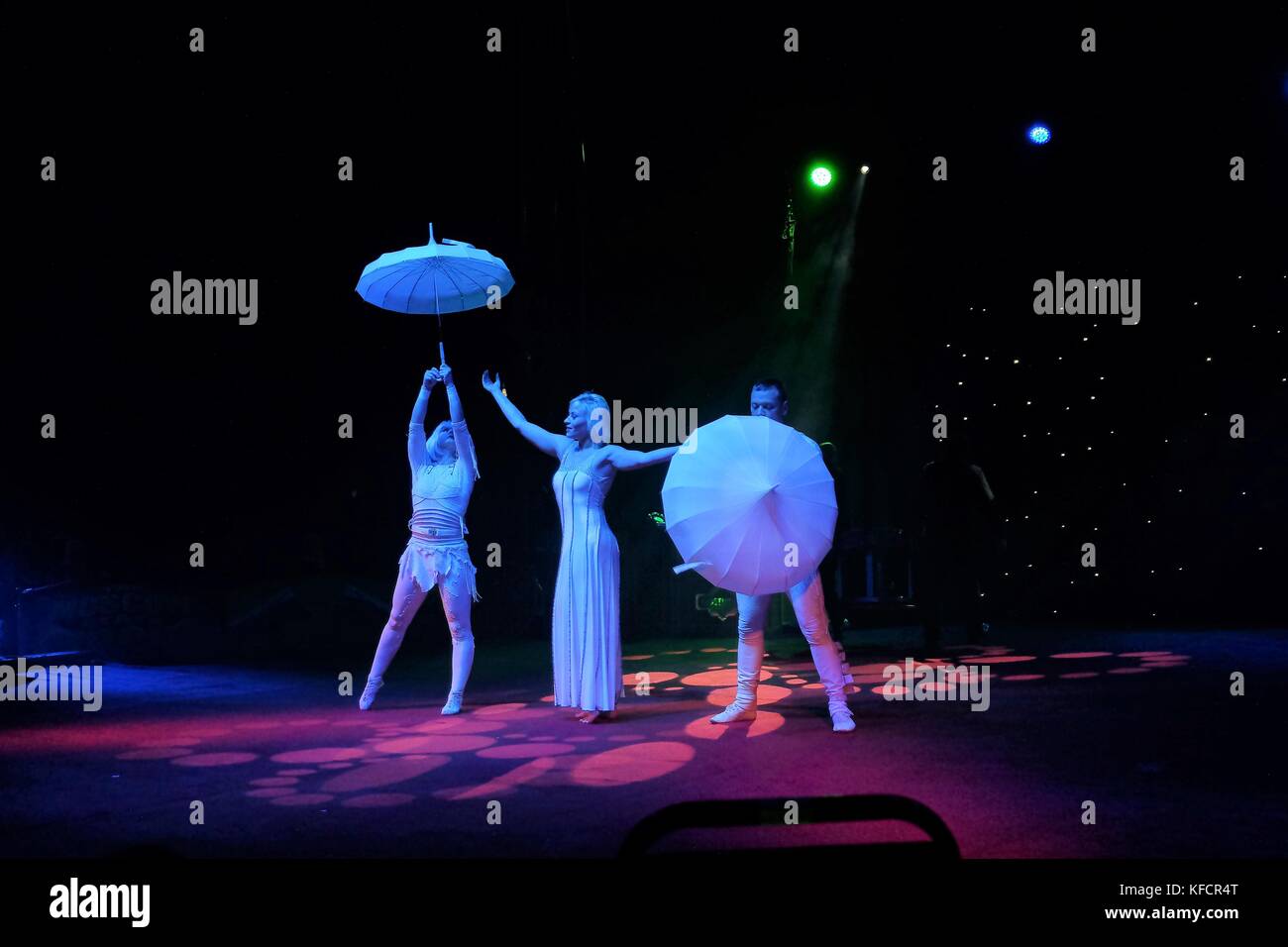 circus performer dancing with umbrella Stock Photo - Alamy