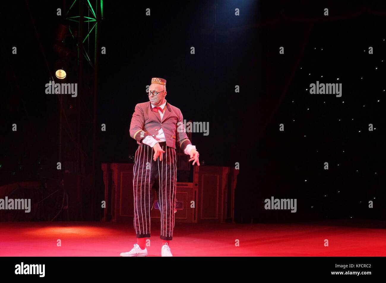 circus performers stripey trousers and hat Stock Photo - Alamy