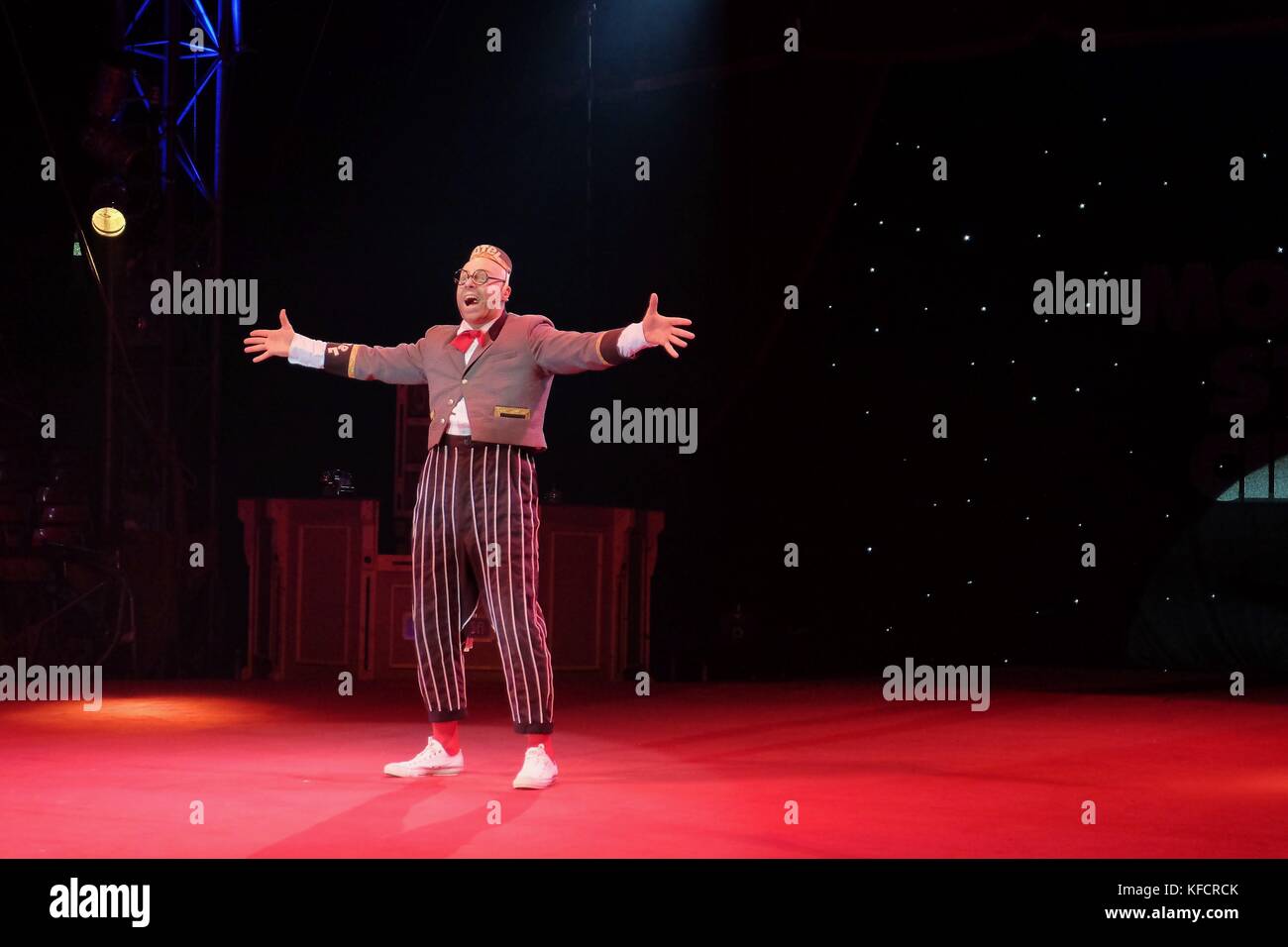 circus performers stripey trousers and hat Stock Photo - Alamy