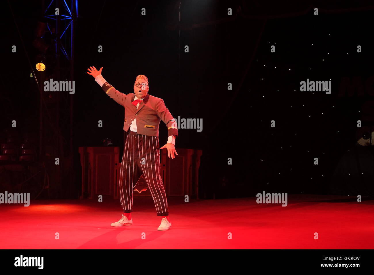 circus performers stripey trousers and hat Stock Photo - Alamy