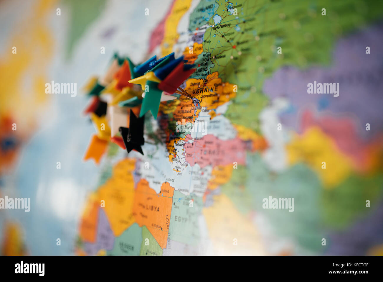 Travel destination points on a map indicated with colorful thumbtacks ...