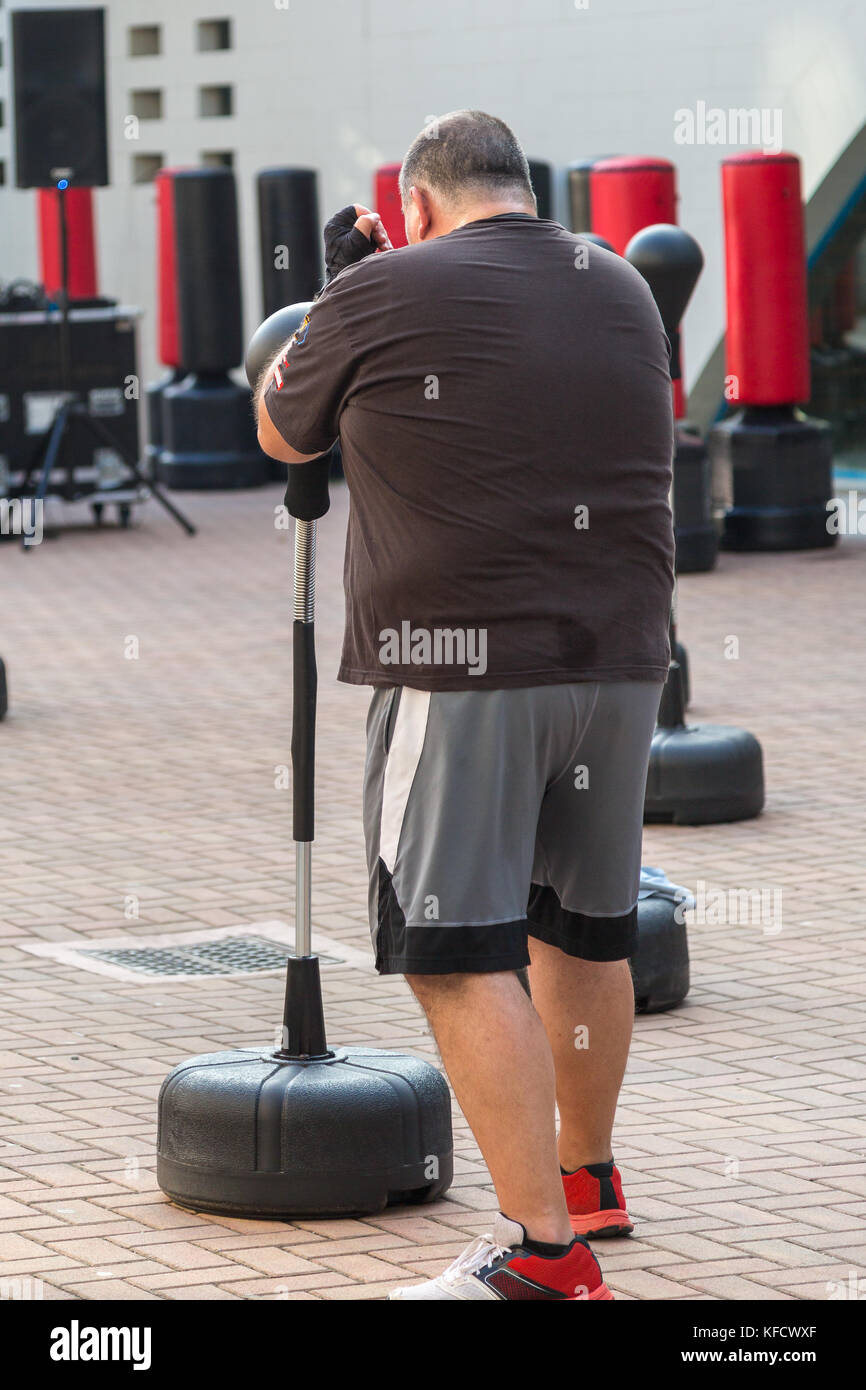 Fat Man in Fitness Class: Workout with Free Standing Boxing Punch Bag ...