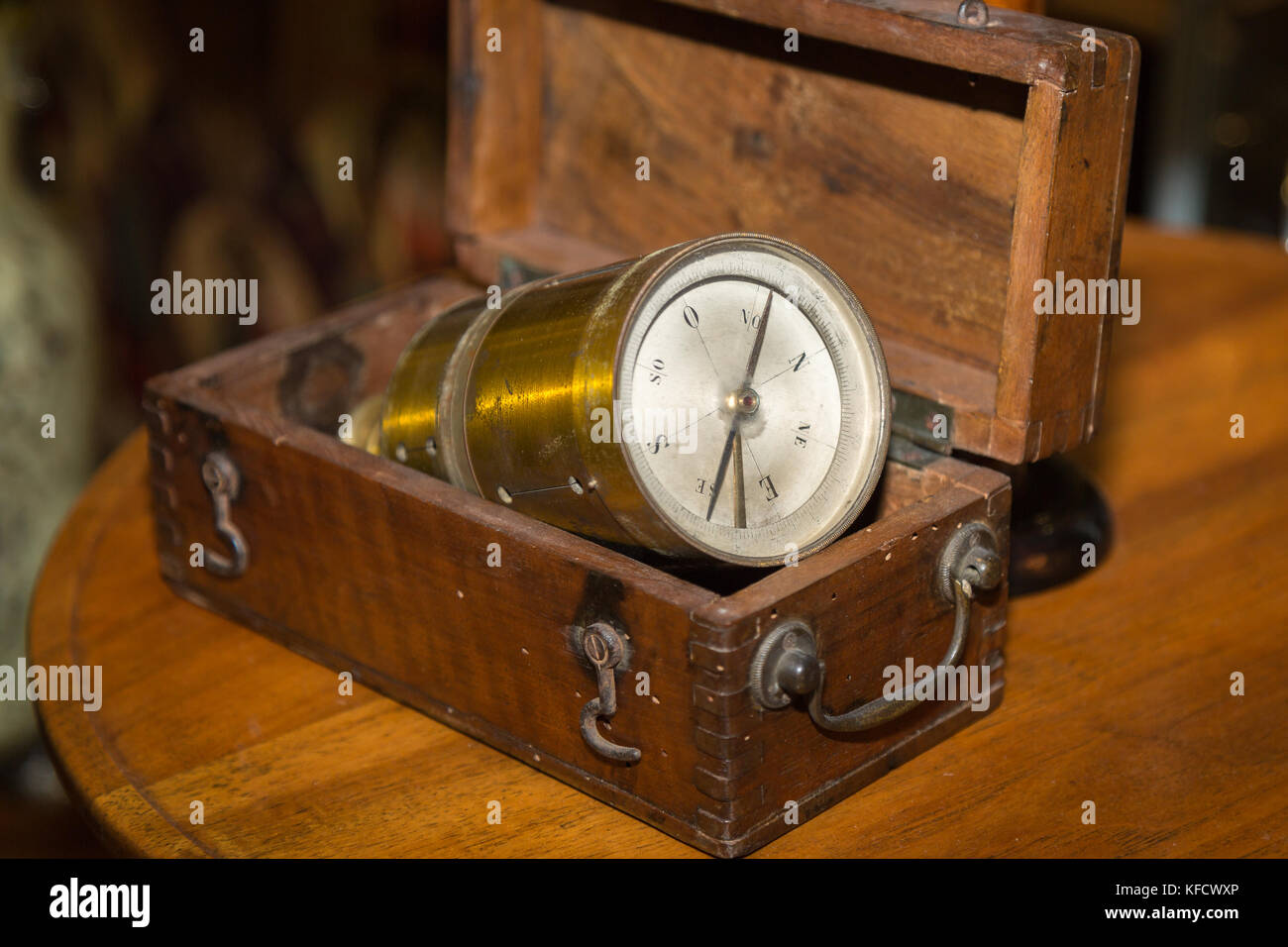 Antique Golden Compass inside Wooden Box on a Table Stock Photo - Alamy