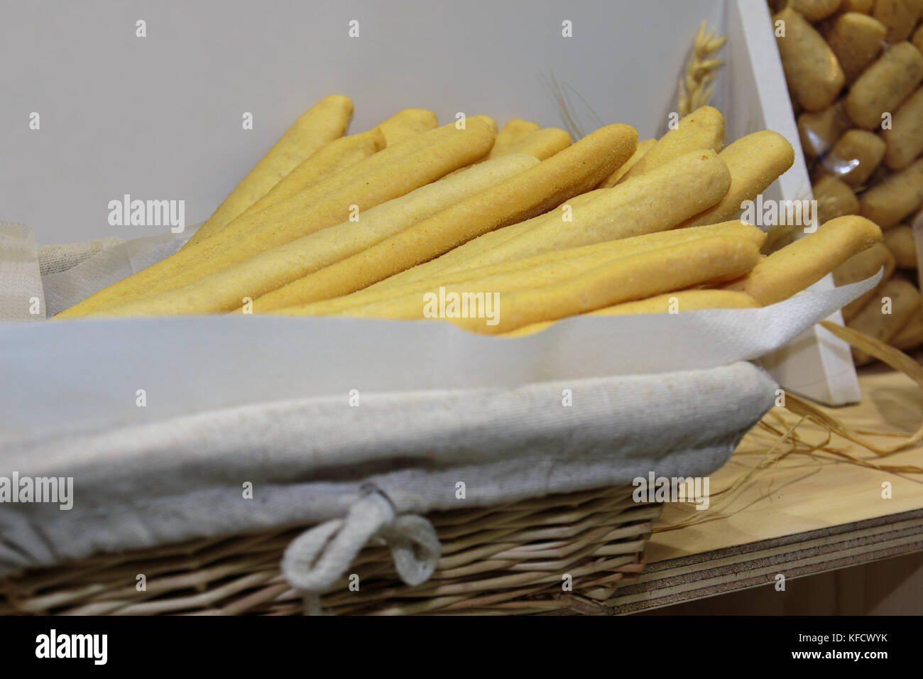 Fresh Breadsticks inside Wicker Basket: Bakery Products Stock Photo - Alamy