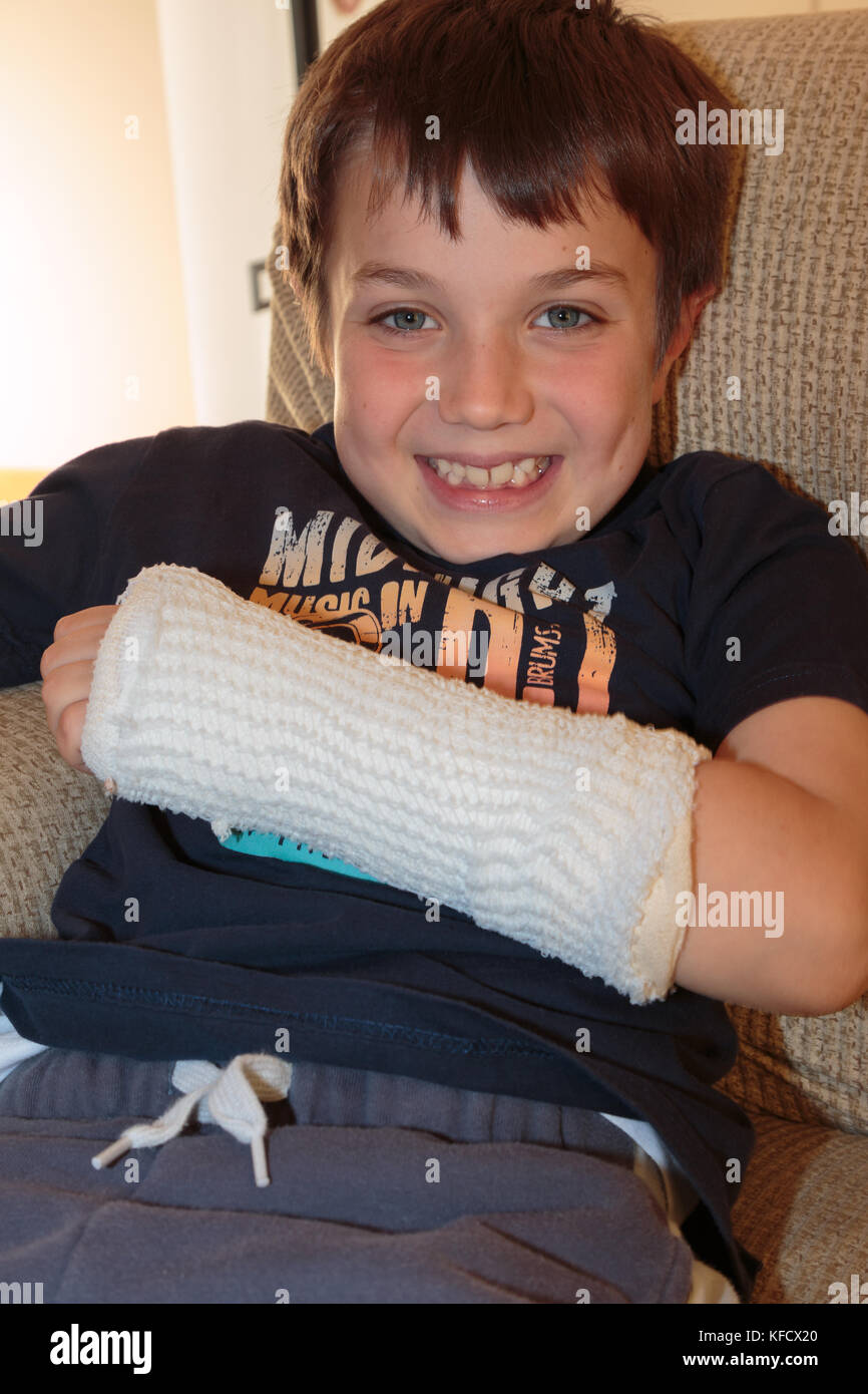 Eight Years Old Child Keeps Broken Arm in Gypsum Stock Photo - Alamy