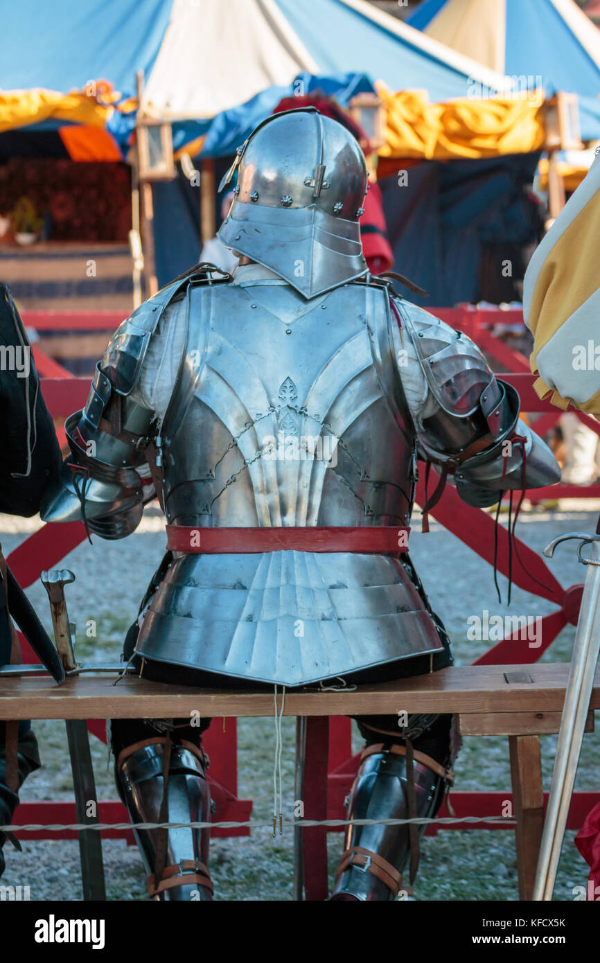 Knight with Silver Helmet sitting on Chair Stock Photo - Alamy