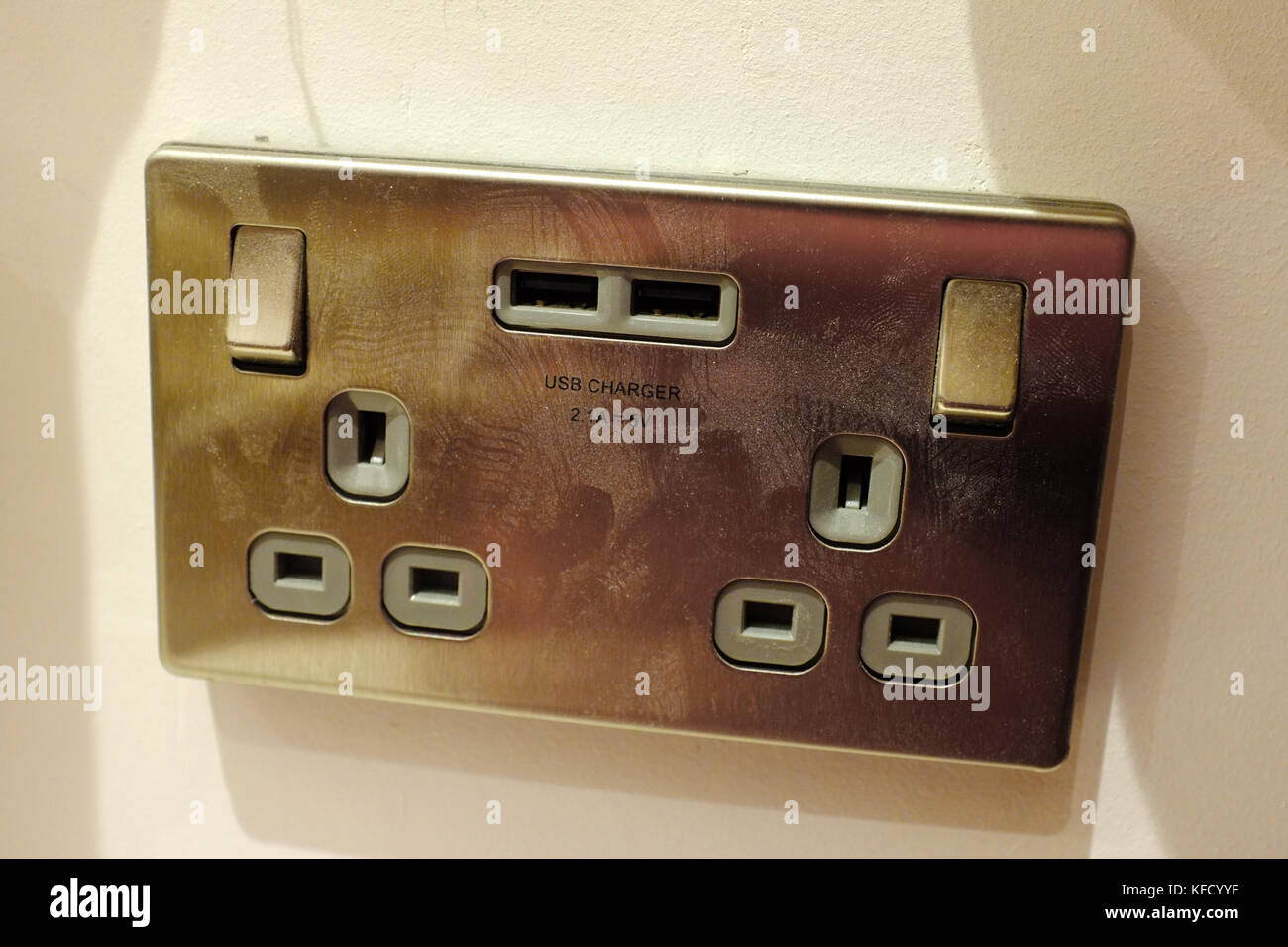 A modern UK plug socket featuring USB inlets Stock Photo - Alamy