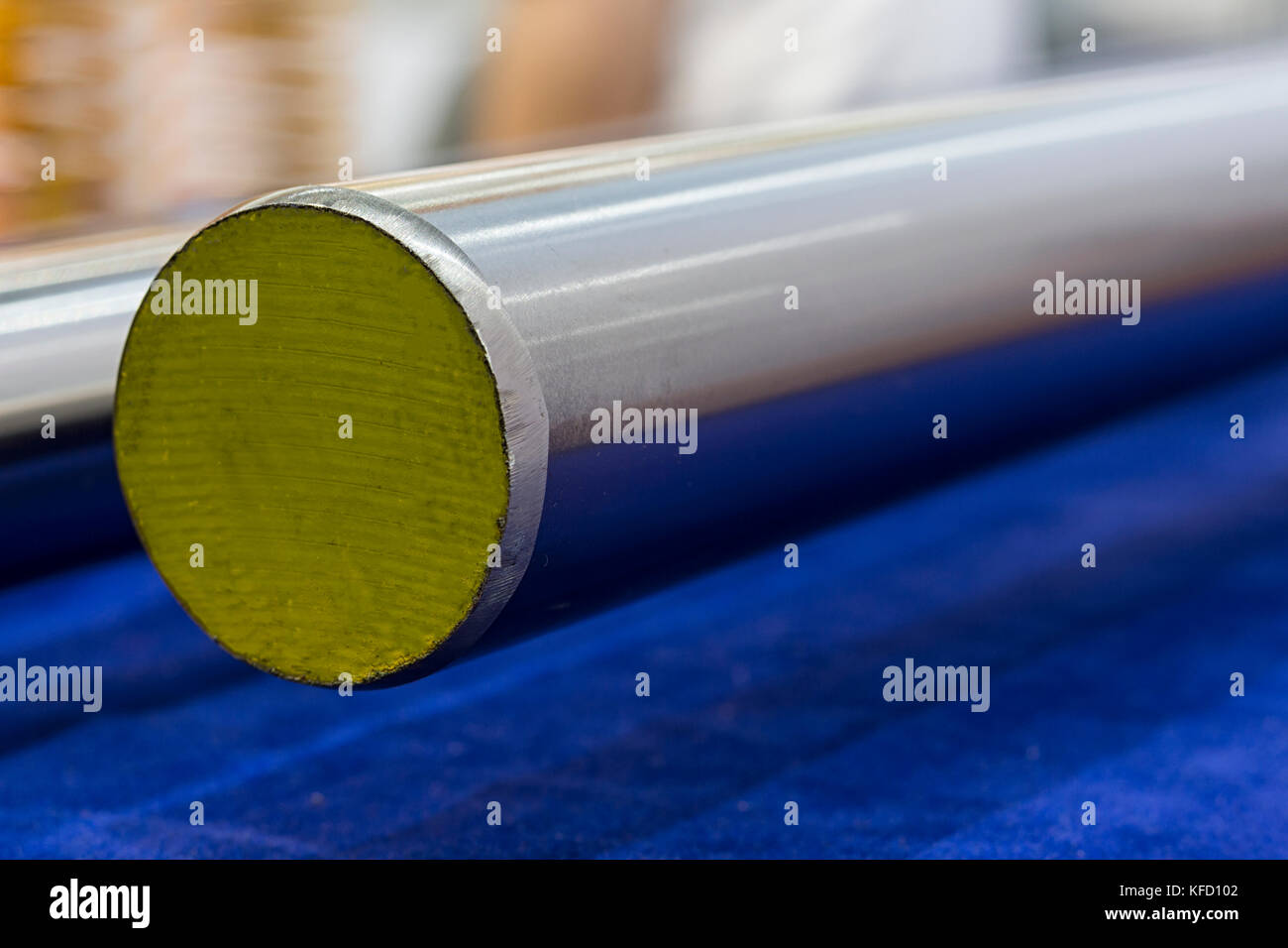 Round stainless steel bar ; grinding process Stock Photo - Alamy