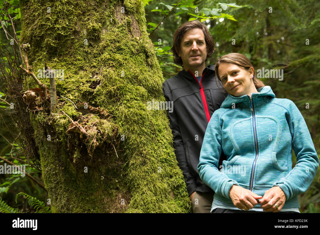 CANADA, Vancouver, British Columbia, Eric and Stephanie Petersen stand ...