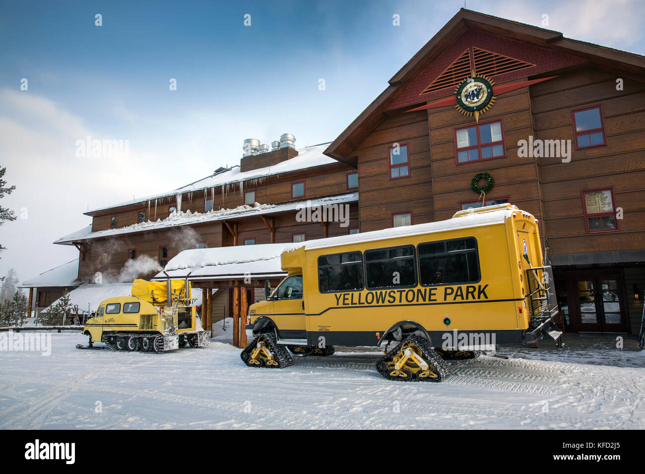 USA, Wyoming, Yellowstone National Park, a Snowcoaches are ready to ...