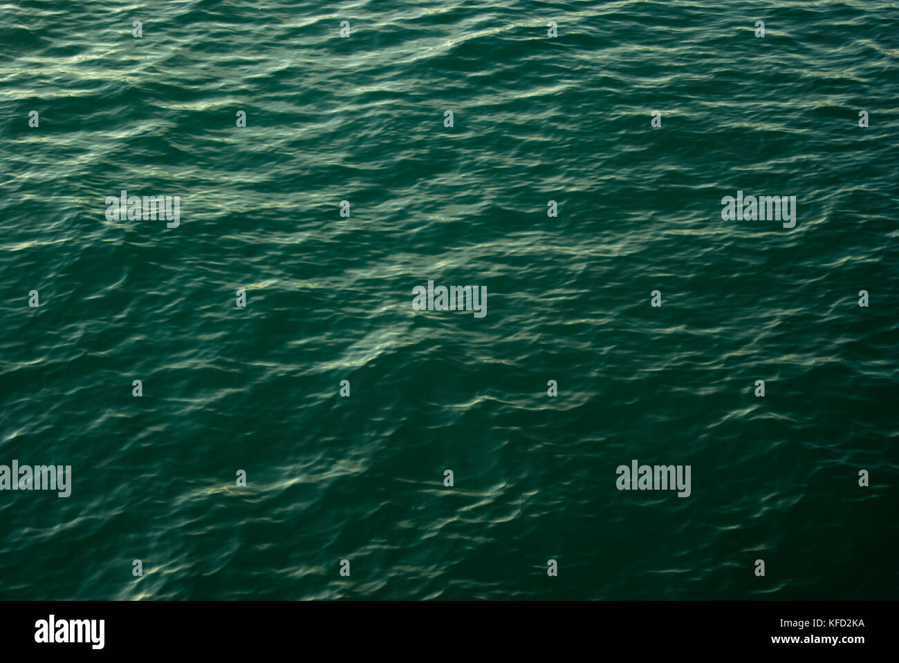 background, texture: sea water surface in evening illumination Stock ...