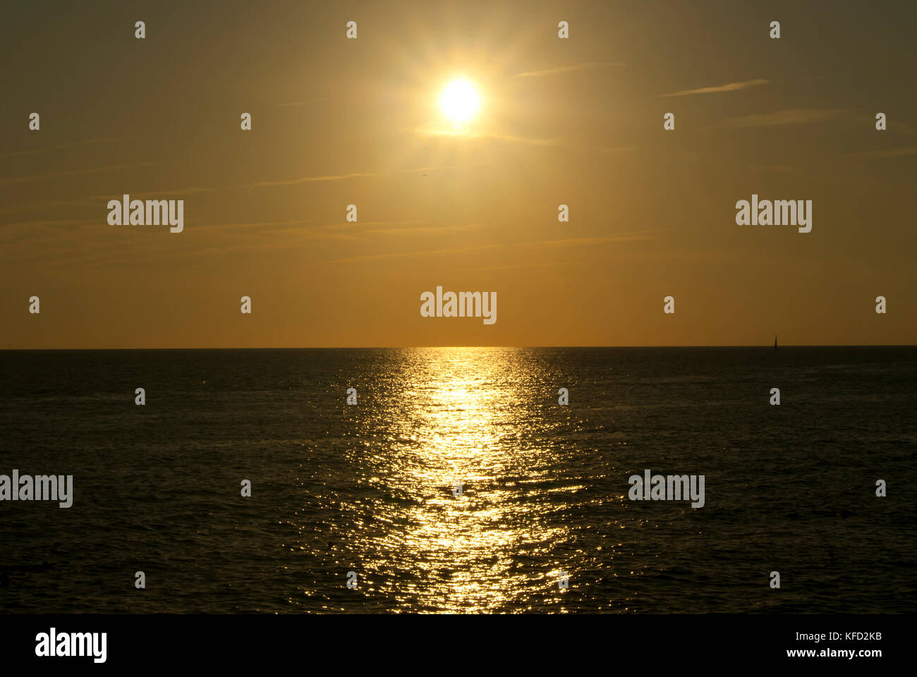 sunset or sunrise over the sea horizon, the sunny path and the ...