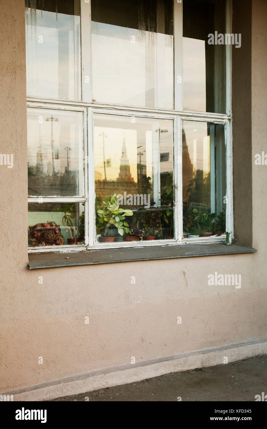 RUSSIA, Moscow. Apartment window with reflection of city Stock Photo ...