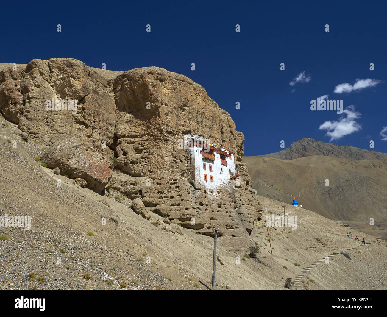 White Buddhist monastery inside is a huge rock, a very unusual building ...