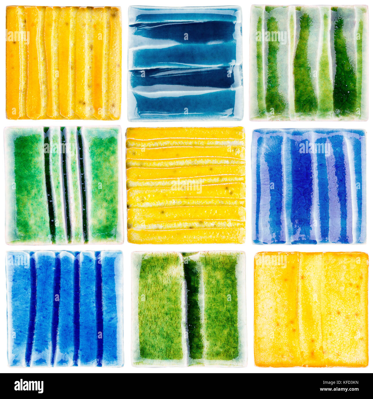 Collection of lined handmade glazed ceramic tiles isolated on white ...