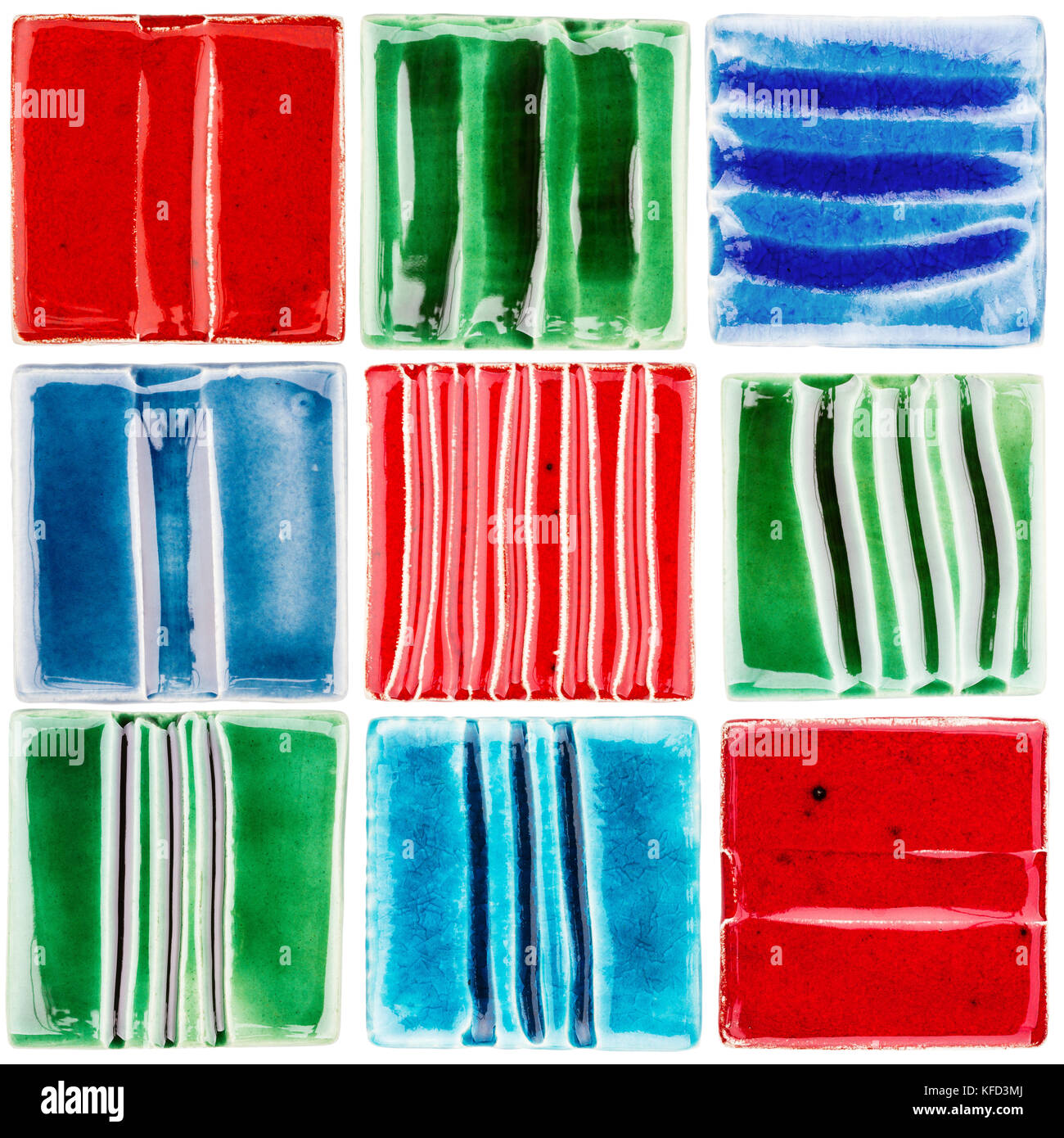 Collection of lined handmade glazed ceramic tiles isolated on white ...