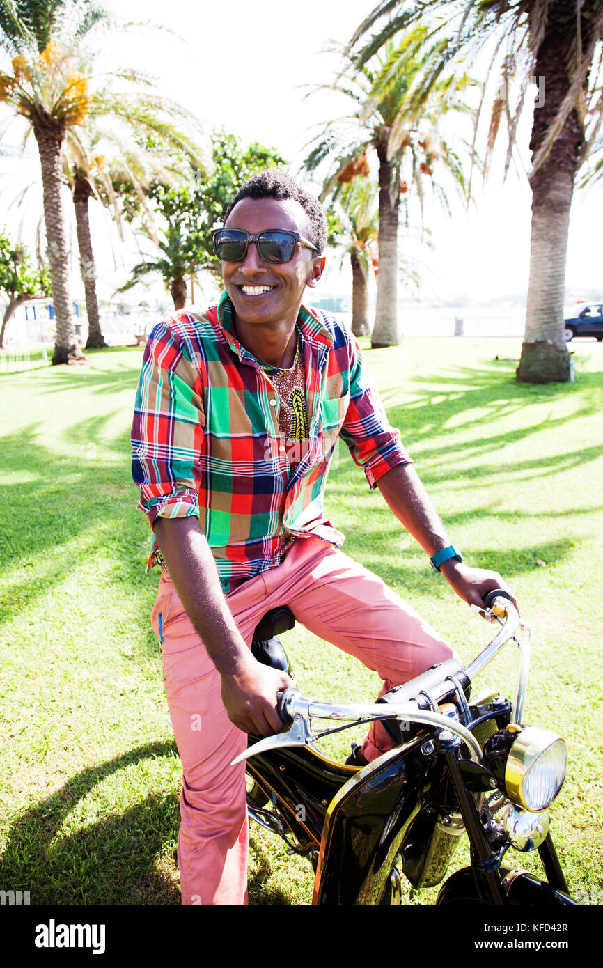 BERMUDA, Hamilton. Chef Marcus Samuelsson on a vintage scooter in Barr ...