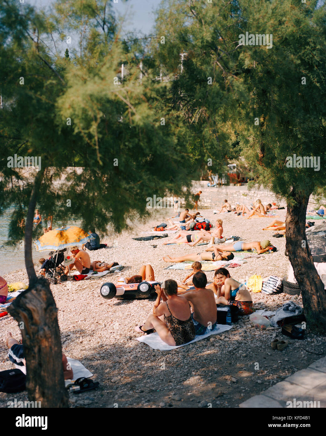 CROATIA, Hvar, Dalmatian Coast, Island, group of people relaxing on ...