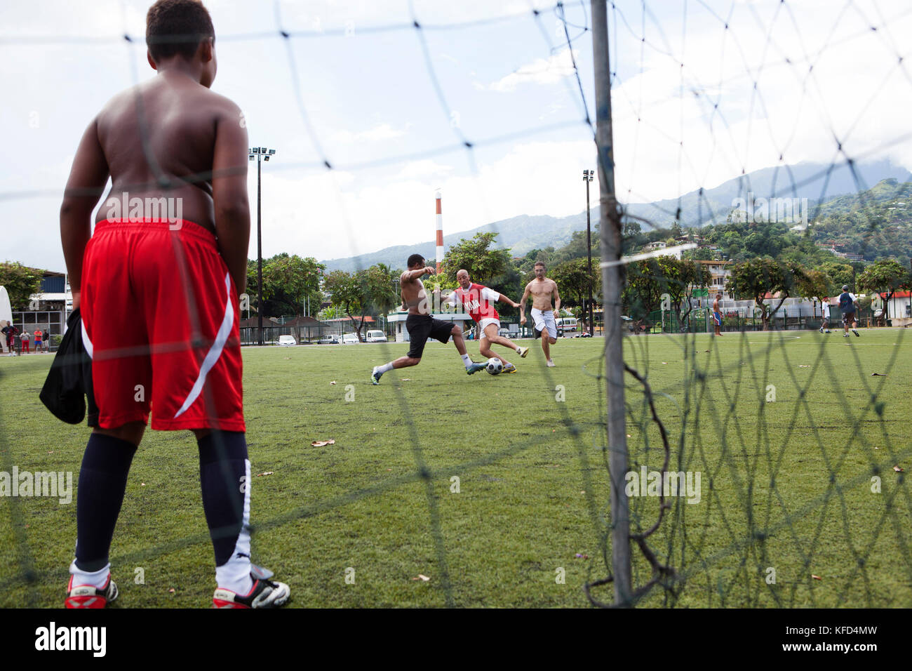 FRENCH POLYNESIA, Tahiti, Papeete. A soccer game between locals at the ...