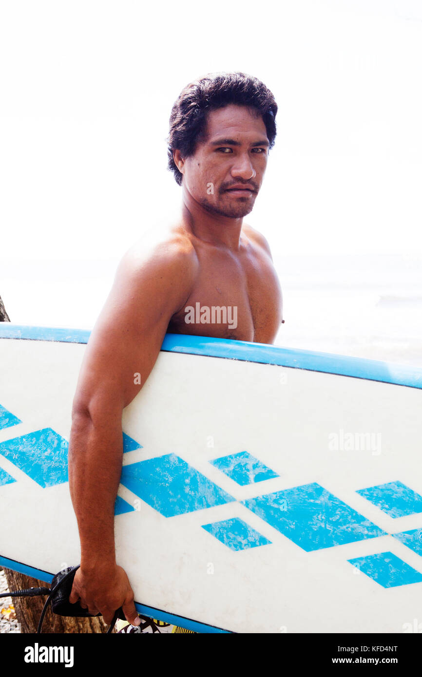 FRENCH POLYNESIA, Tahiti. Local surfers at Papenoo Beach Stock Photo ...
