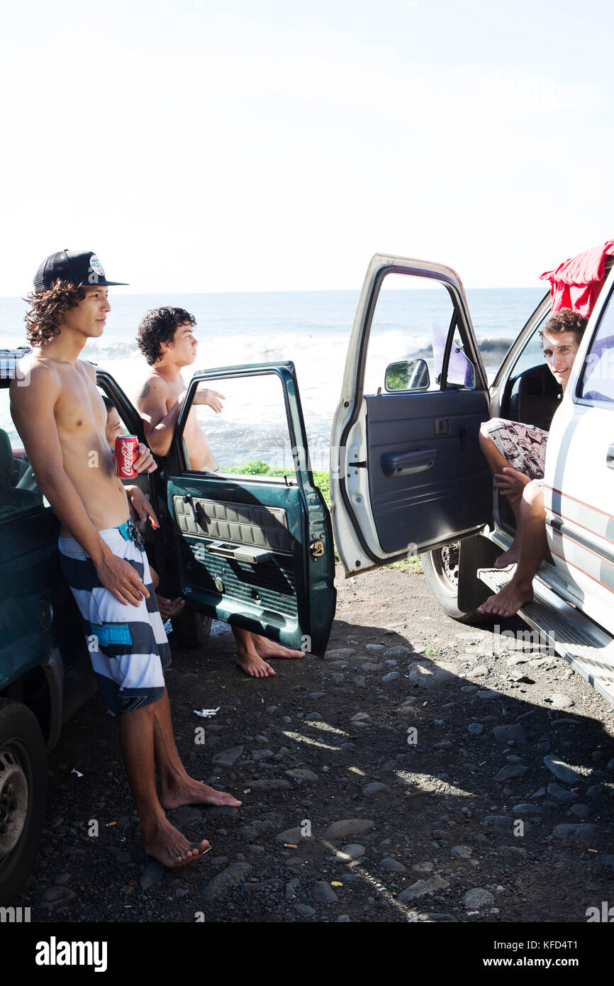 FRENCH POLYNESIA, Tahiti. Local surfers at Papenoo Beach Stock Photo ...